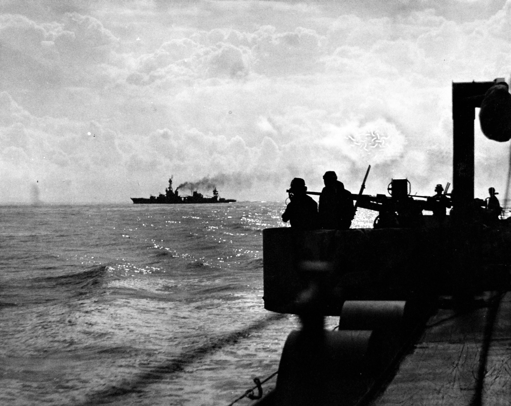 USS Augusta (CA-31) under fire from French battleship Jean Bart during ...